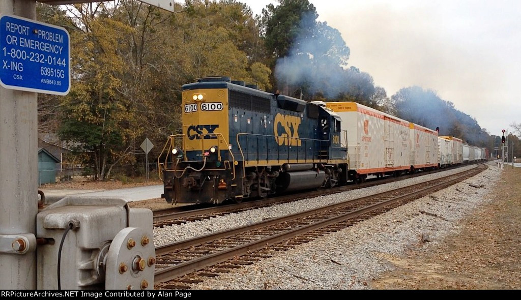 CSX GP40-2 6100 hustling a local